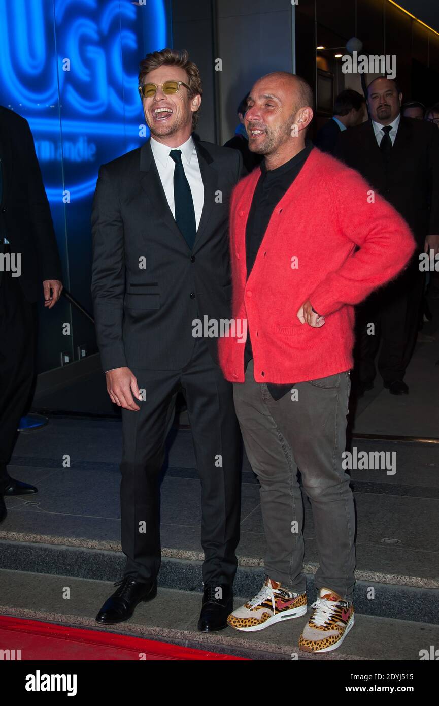 Simon Baker and Director Dan Mazer attending the French premiere of the movie I Give It A Year ...