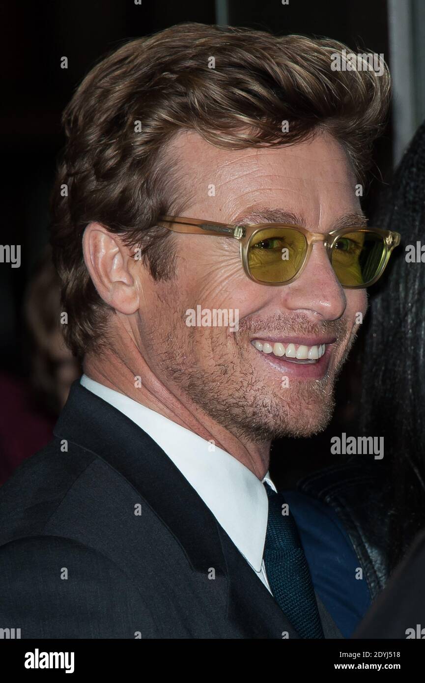 Simon Baker attending the French premiere of the movie I Give It A Year ...