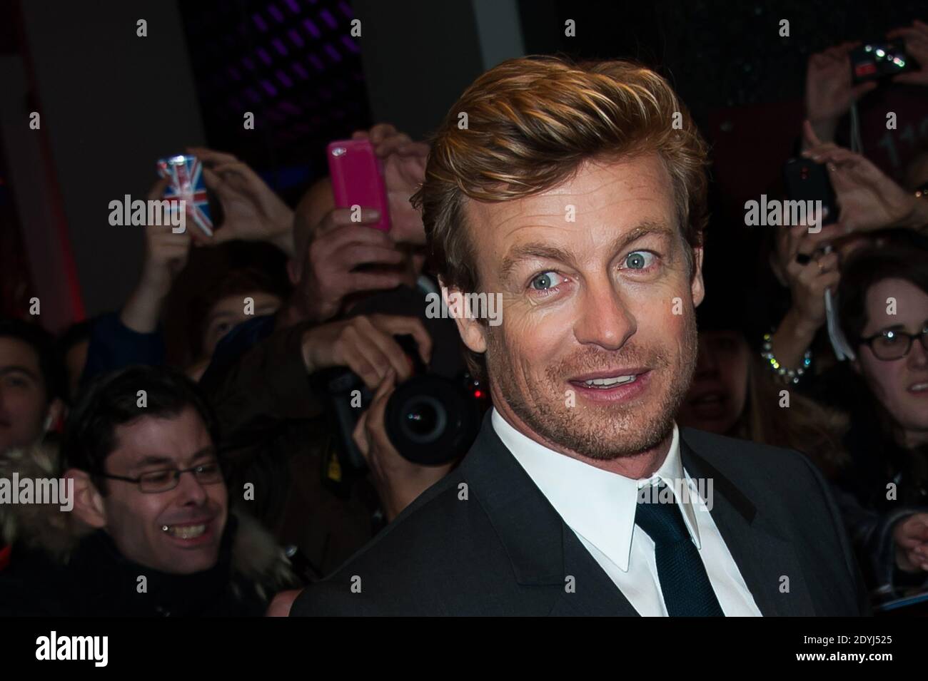 Simon Baker attending the French premiere of the movie I Give It A Year ...