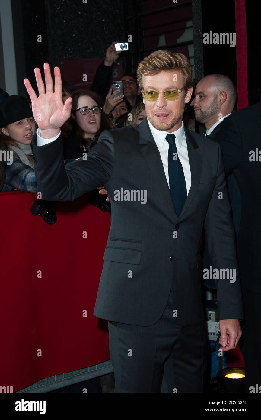 Simon Baker attending the French premiere of the movie I Give It A Year ...