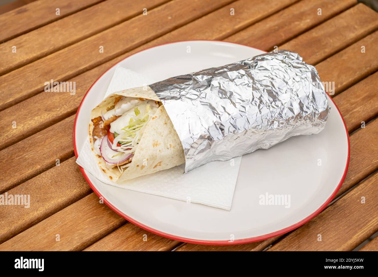 Durum Kebab in a local pizza and gyros restaurant Stock Photo - Alamy