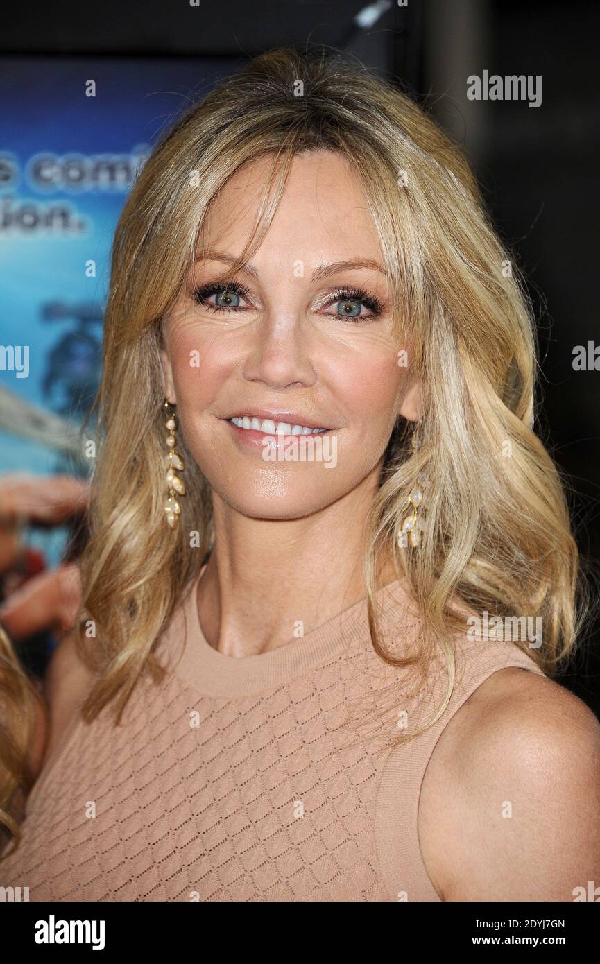 Heather Locklear attends the "Scary Movie 5" premiere at the Cinerama ...