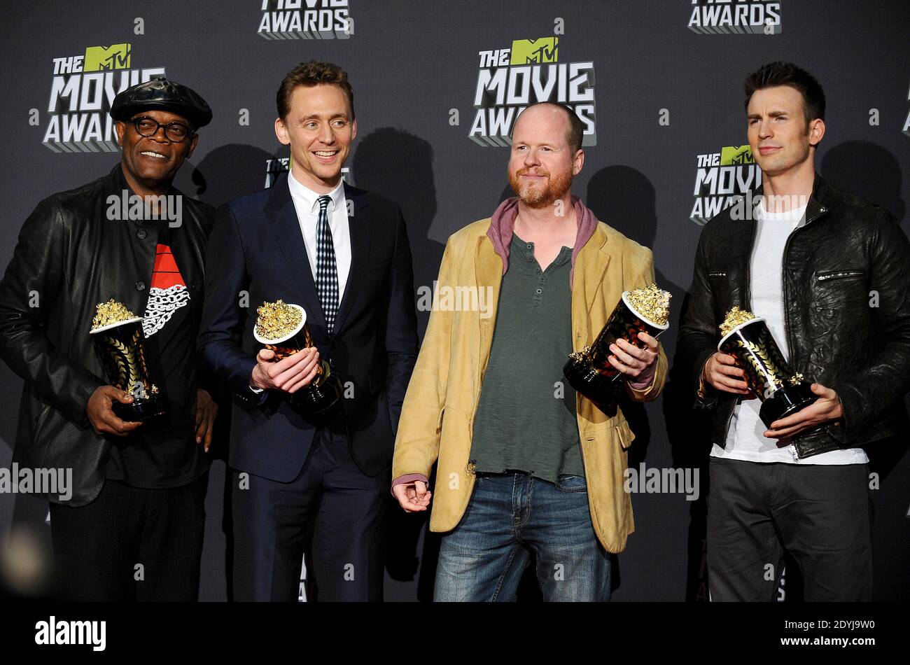 Samuel L. Jackson, Tom Hiddleston, Joss Whedon and Chris Evans pose in ...
