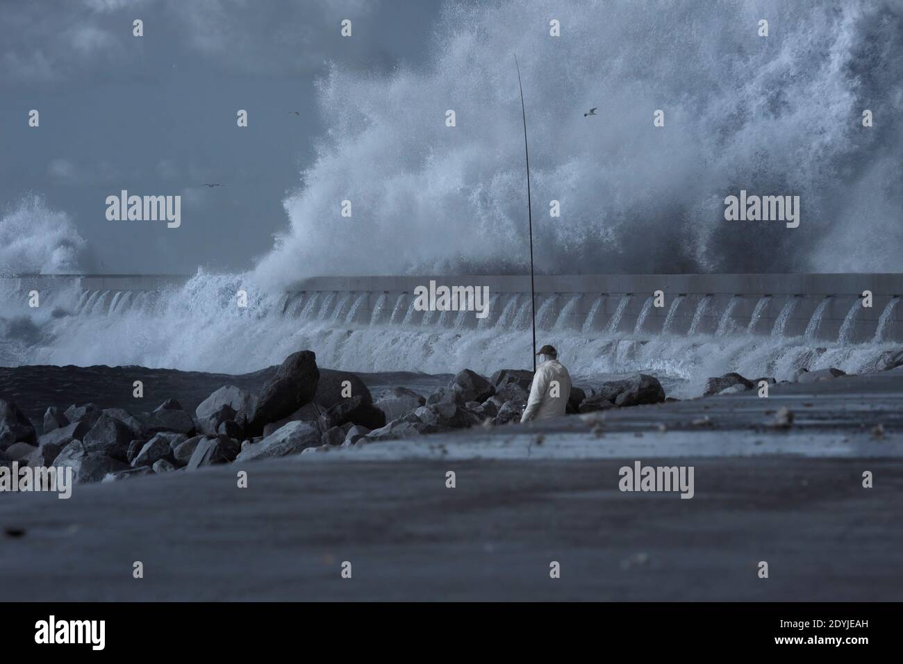 Wave splash. Douro river south pier in a stormy day. Used infrared ...