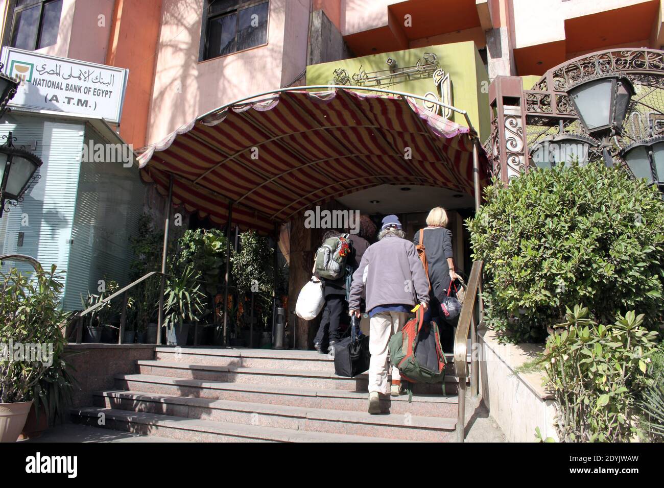 3 old french activists people enter in Cairo hotel Stock Photo - Alamy
