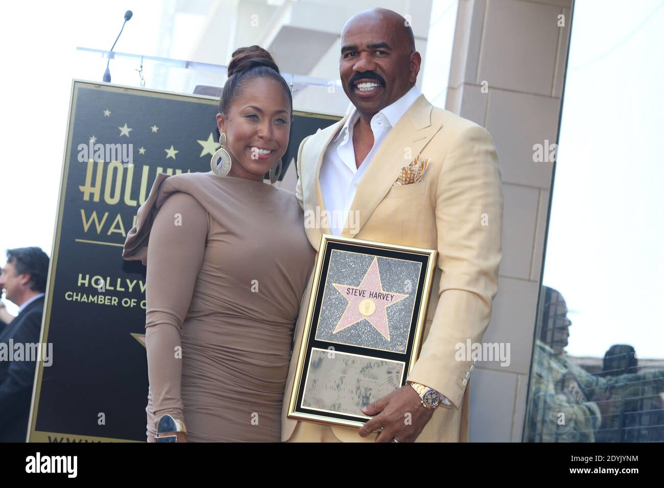 Steve Harvey and wife Marjorie Bridges pose as Harvey receives a star ...