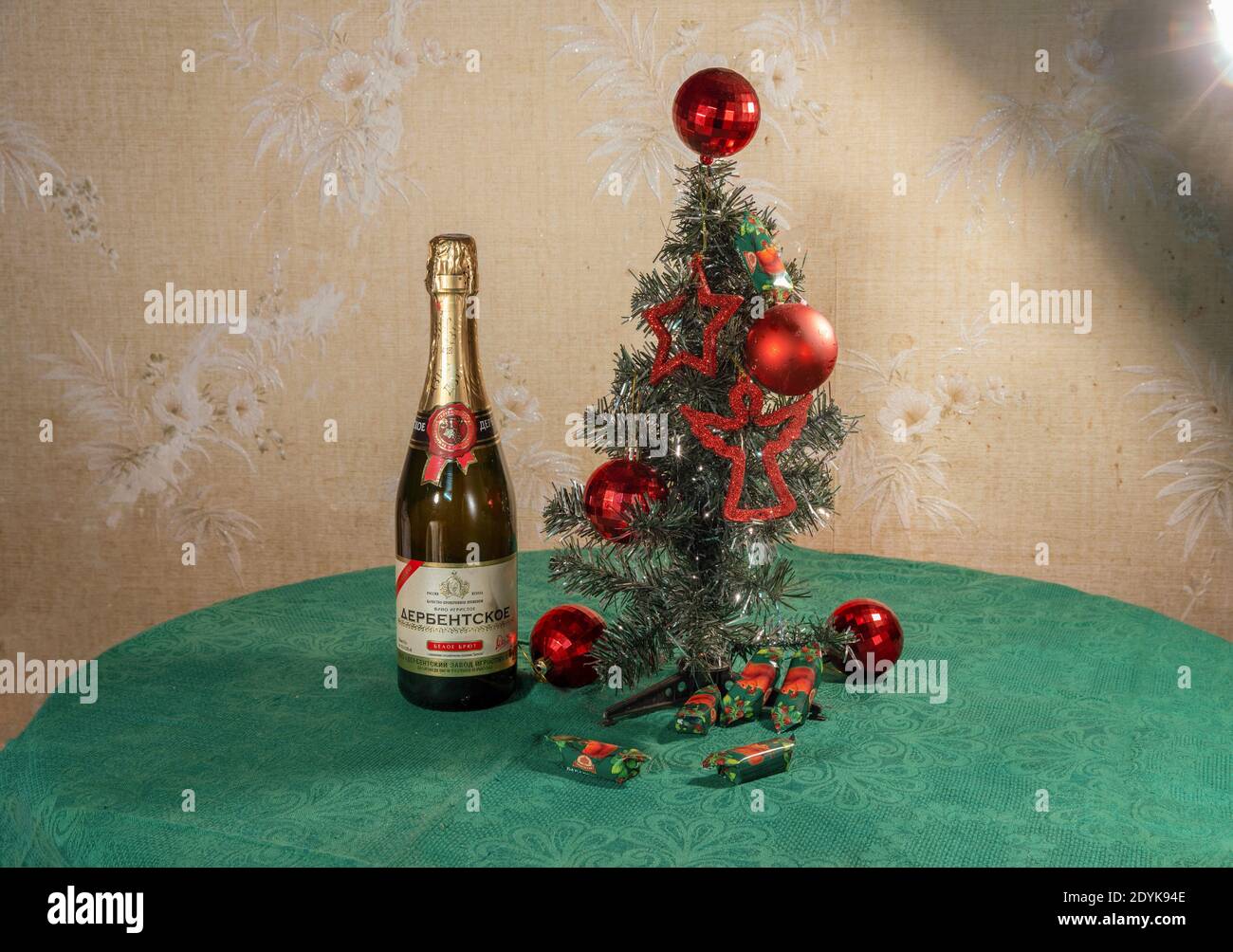 12-25-2020 Moscow, Russia . Small artificial Christmas tree on table ...