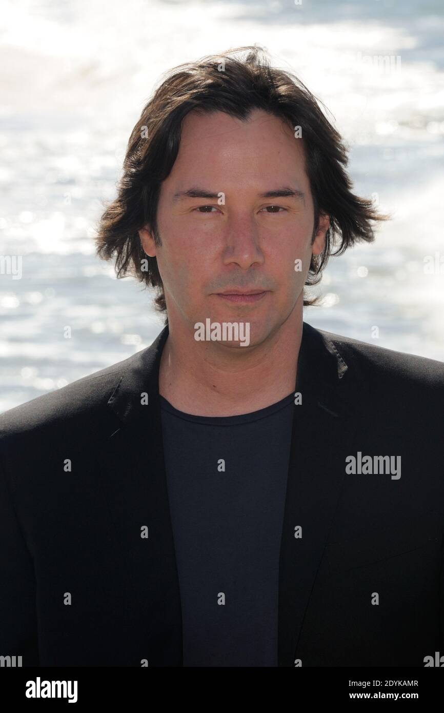 Keanu Reeves poses at a photocall for the film Man Of Tai Chi as part ...