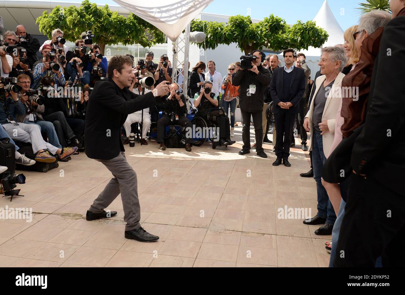 Roman Polanski, Emmanuelle Seigner, Mathieu Amalric pose at the ...