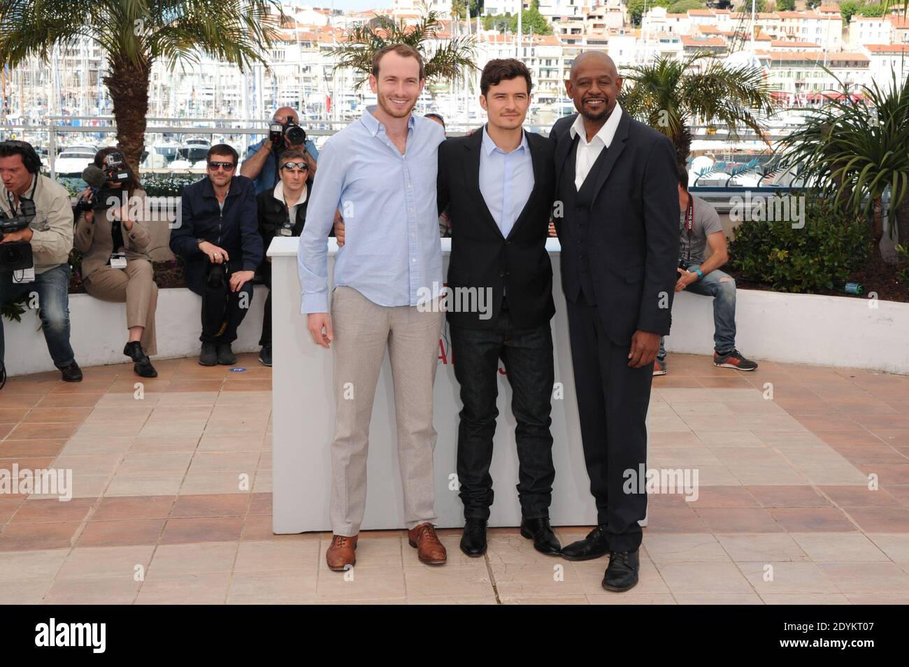 Conrad Kemp, Orlando Bloom and Forest Whitaker pose at the photocall ...