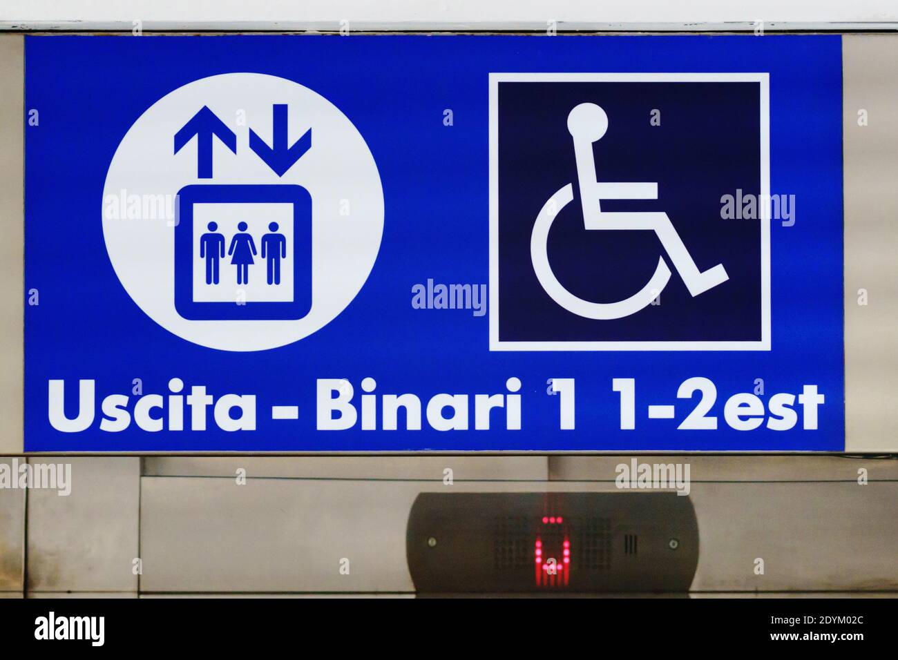 Closeup sign board shows direction to railway train station platform 1 ...