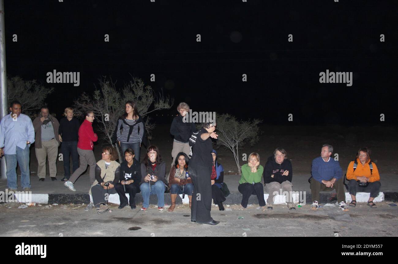 French activists are waiting for at checkpoint of Cairo an ...