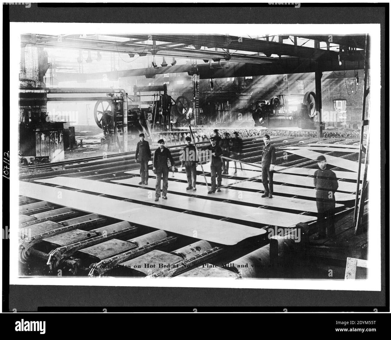 Laying out plates on hot bed at no. 1 plate mill Stock Photo - Alamy