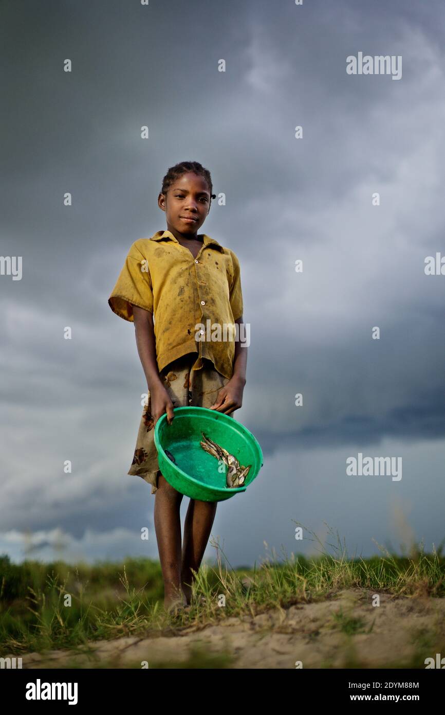 Zambian little girl after fishing, Limulunga, Barotseland, Zambia Stock ...