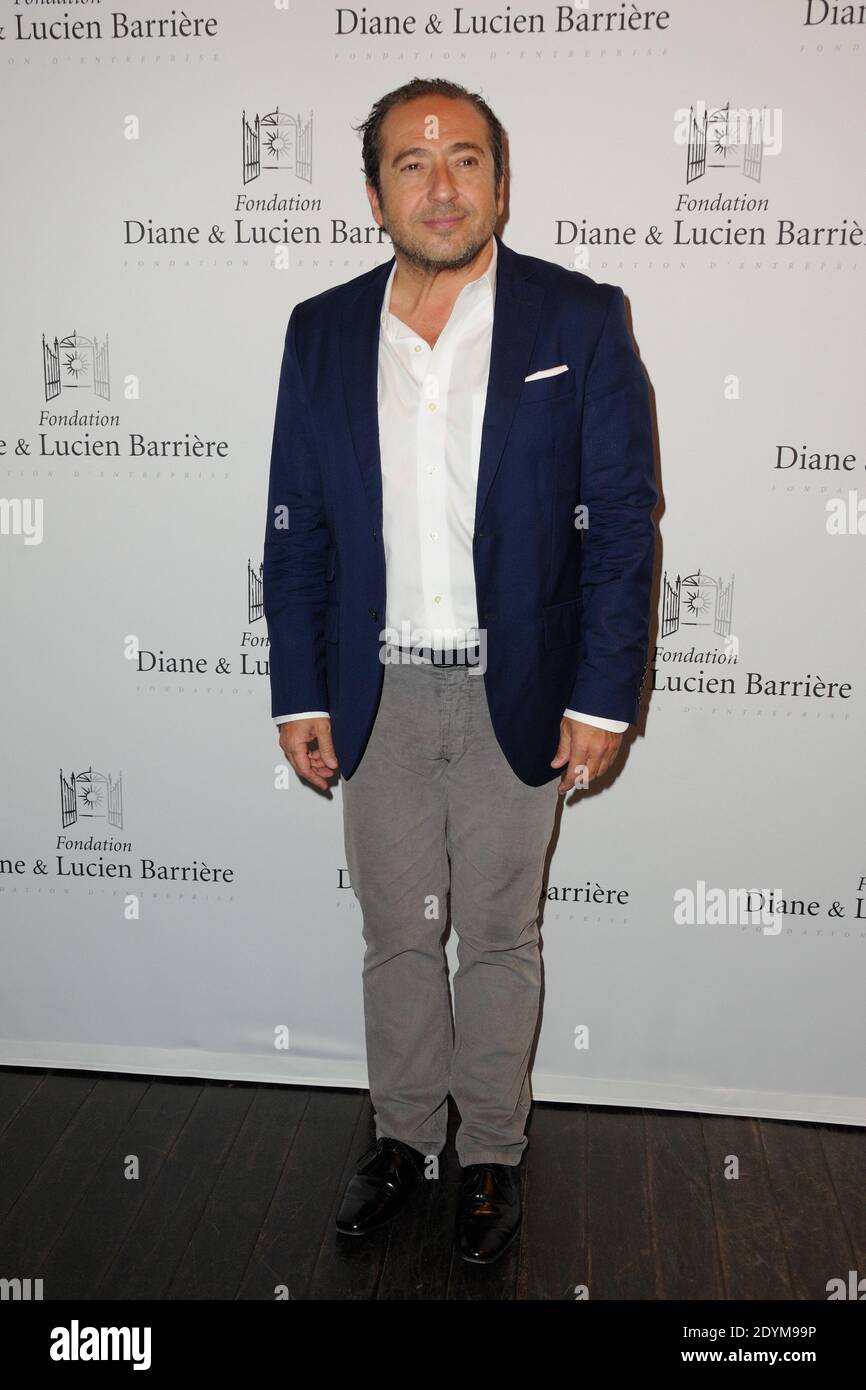 Patrick Timsit attending the premiere of the film 'Les Petits Princes ...