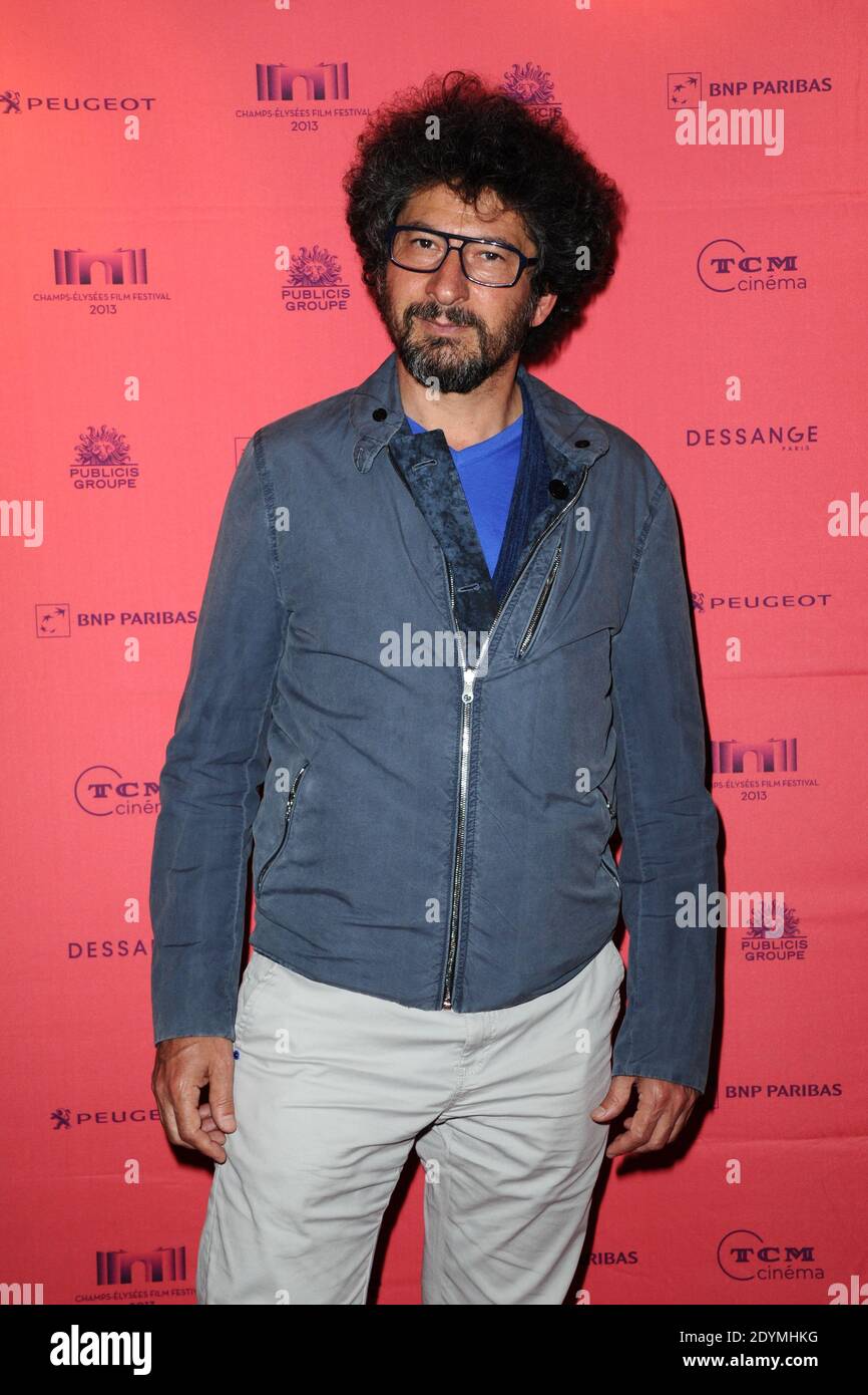 Radu Mihaileanu attending the premiere for the film Paris A Tout Prix ...