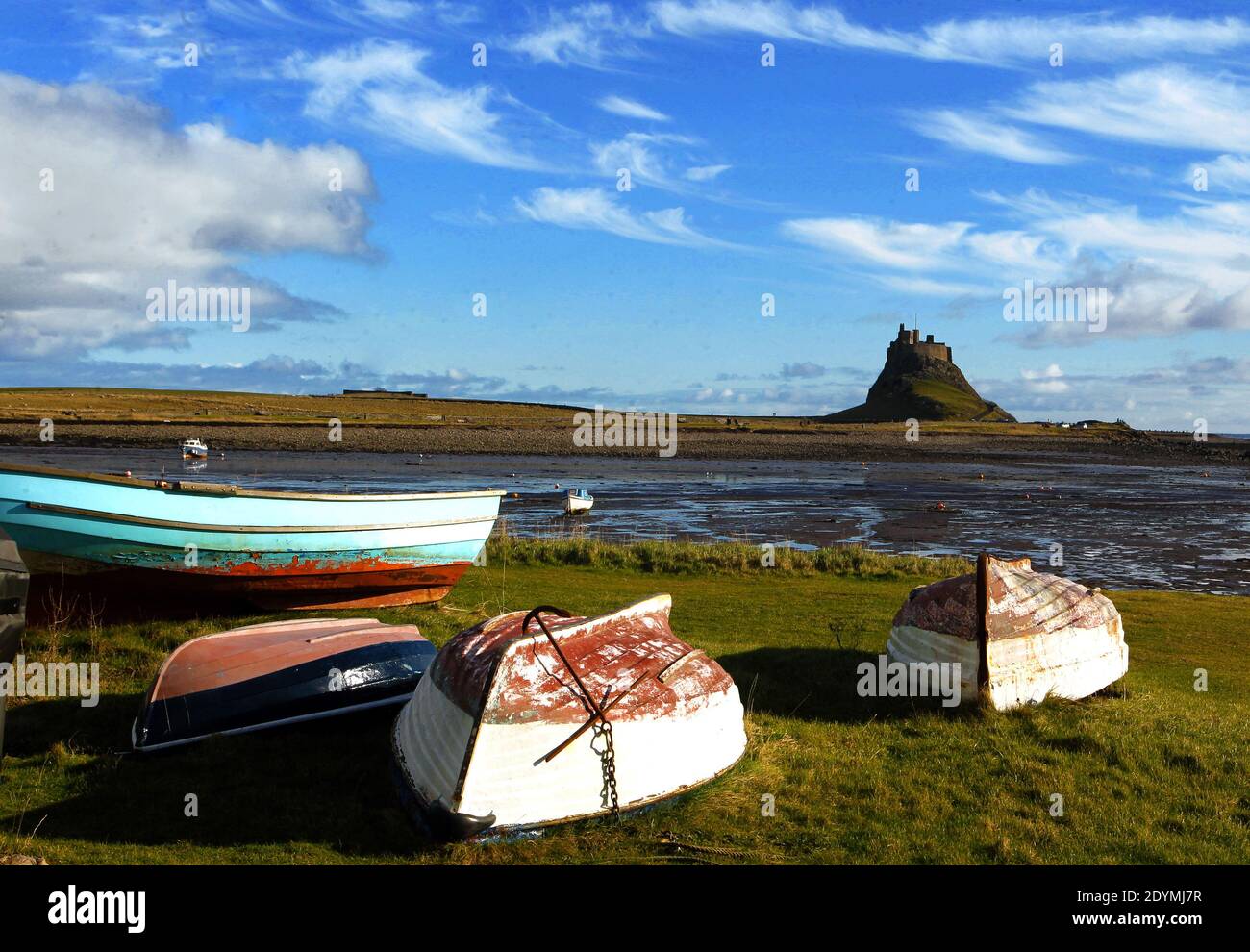 The castle and harbor at Holy Island Stock Photo - Alamy