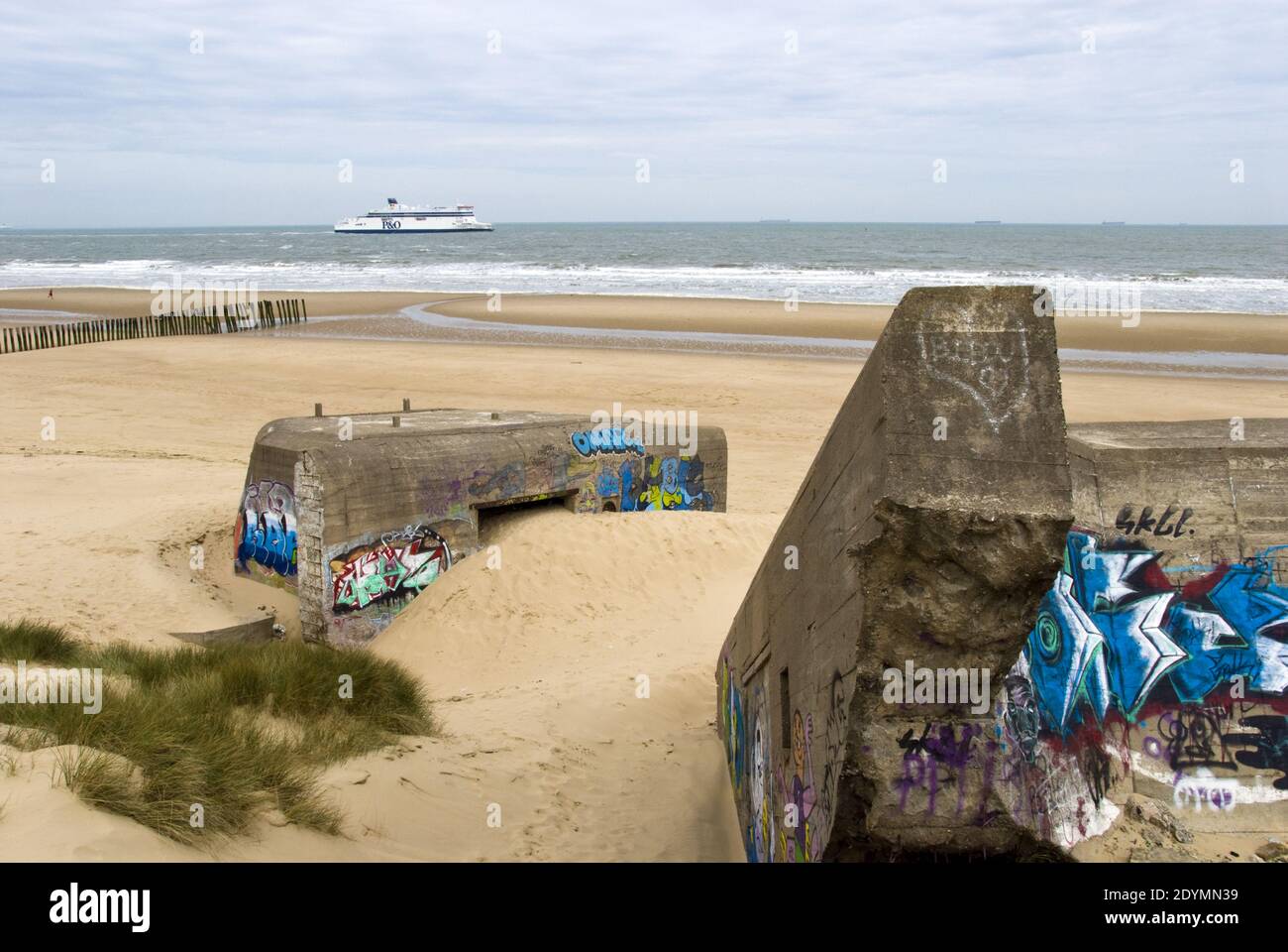 English Channel ferry sails by remains of World War 2 German concrete ...