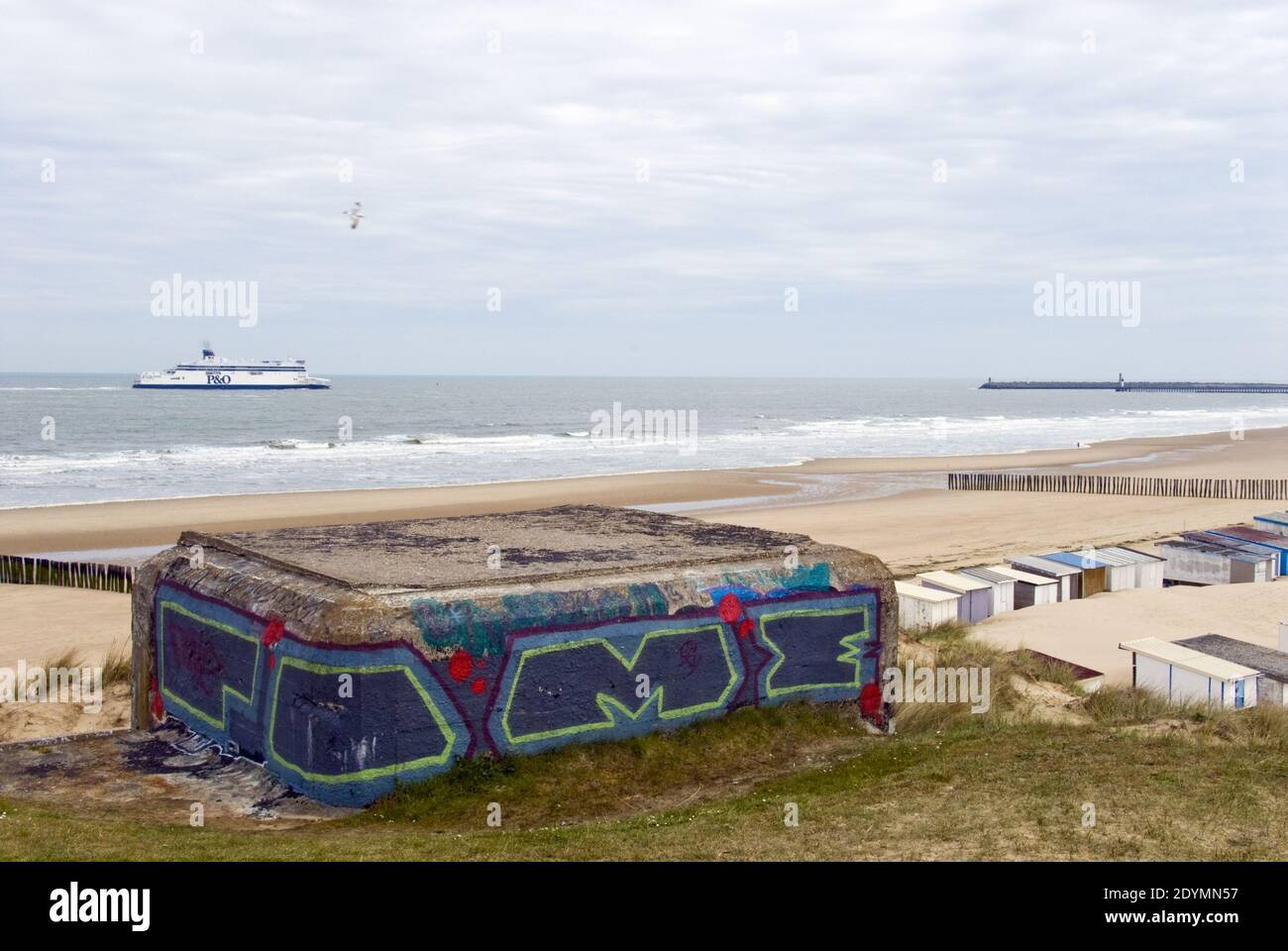 English Channel ferry sails by remains of World War 2 German concrete ...