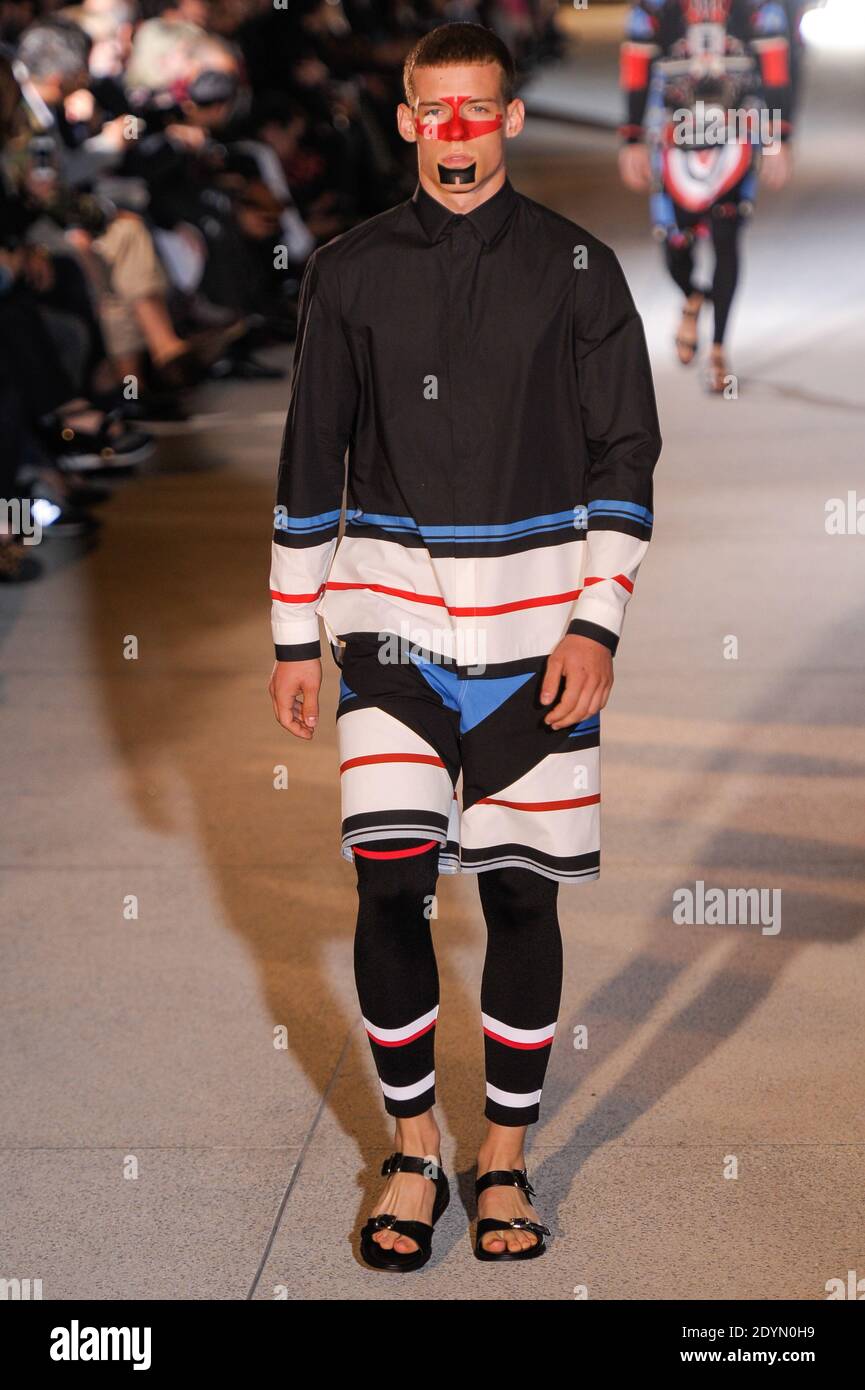 A model displays a creation designed by Riccardo Tisci for Givenchy ...