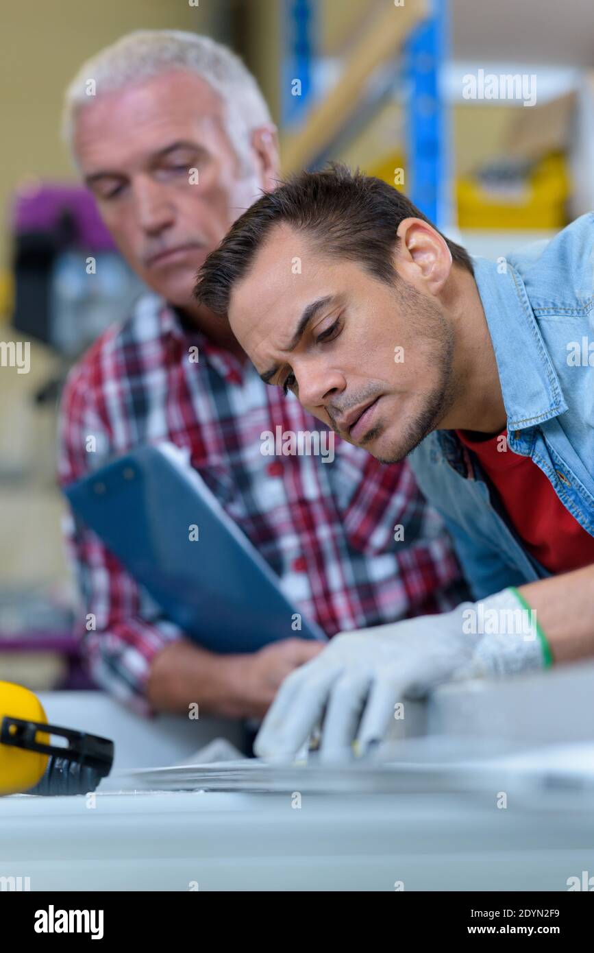 process of measuring in the workshop Stock Photo - Alamy
