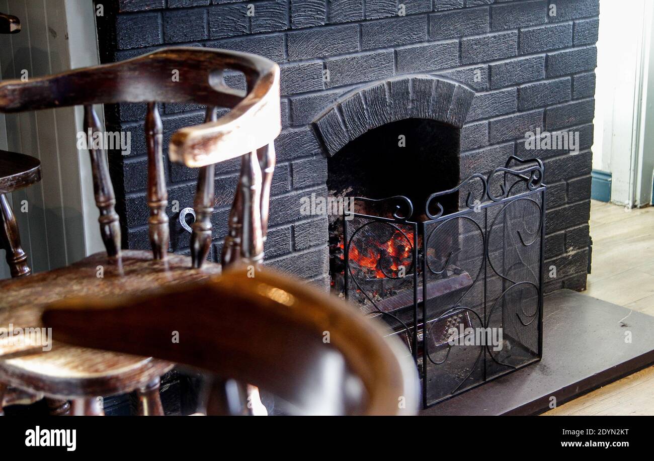 Coal fire in a pub on Holy Island Stock Photo - Alamy