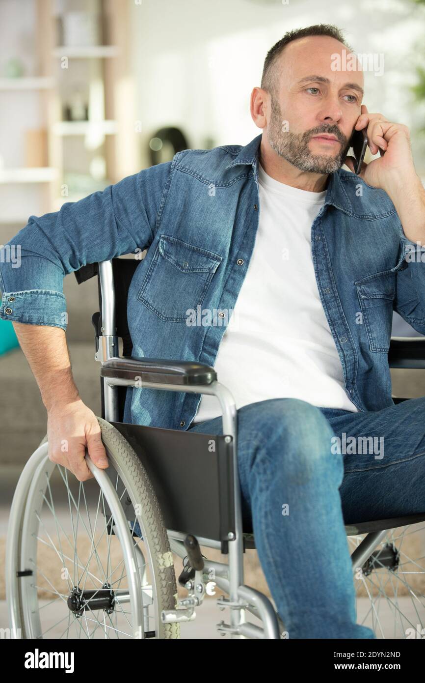disabled man working from home Stock Photo - Alamy