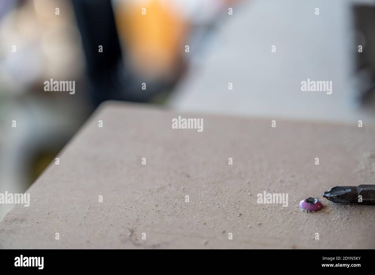 Damaged screw head caused by using the wrong bit and speed to install ...