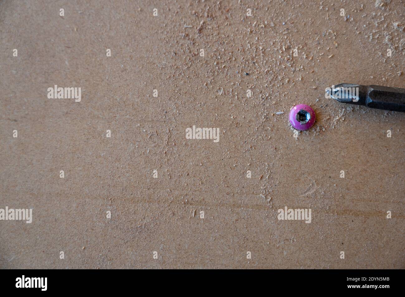 Damaged screw head caused by using the wrong bit and speed to install ...