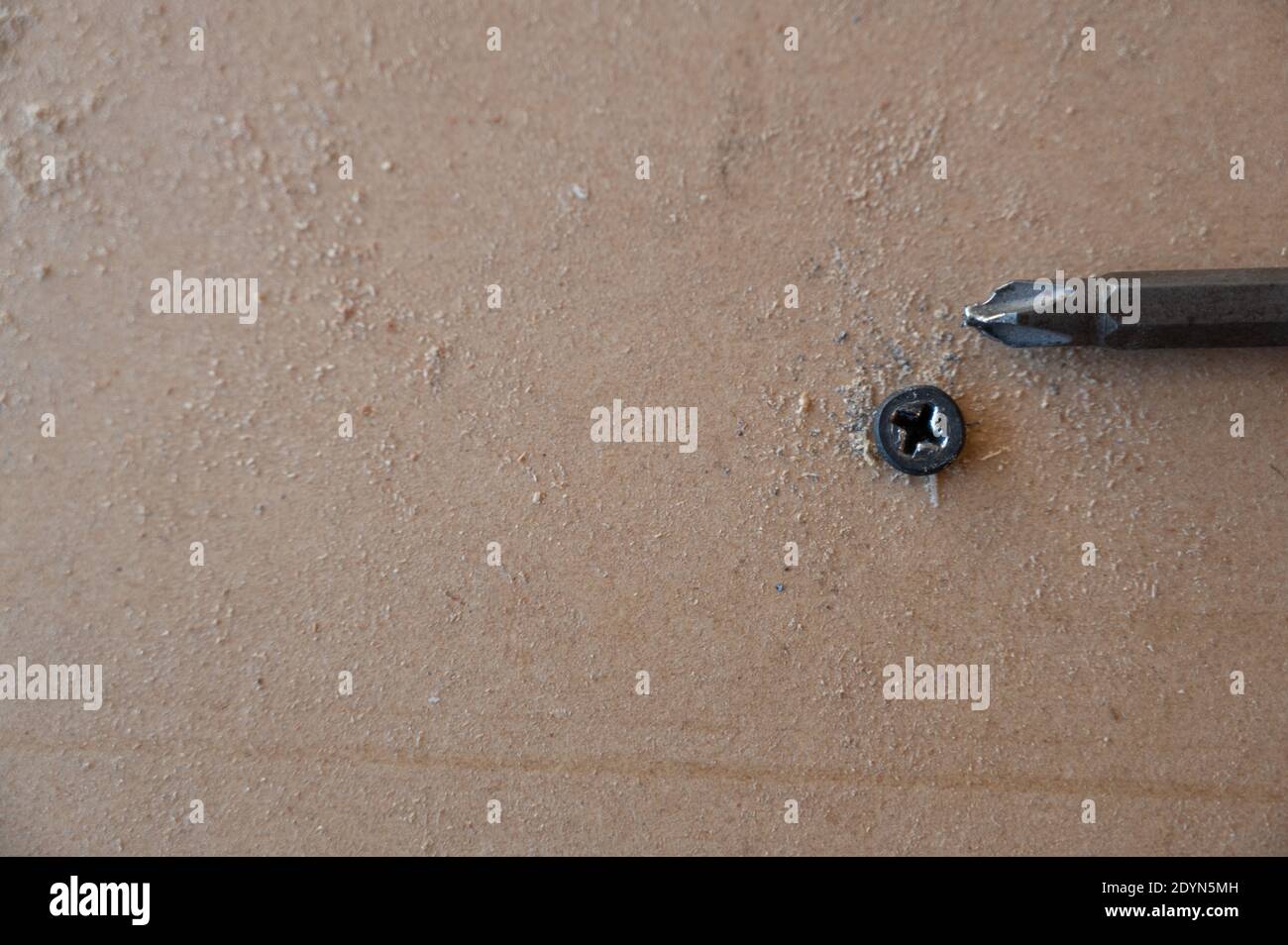 Damaged screw head caused by using the wrong bit and speed to install ...