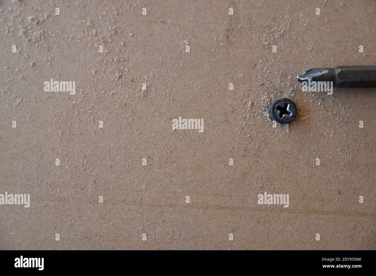 Damaged screw head caused by using the wrong bit and speed to install ...