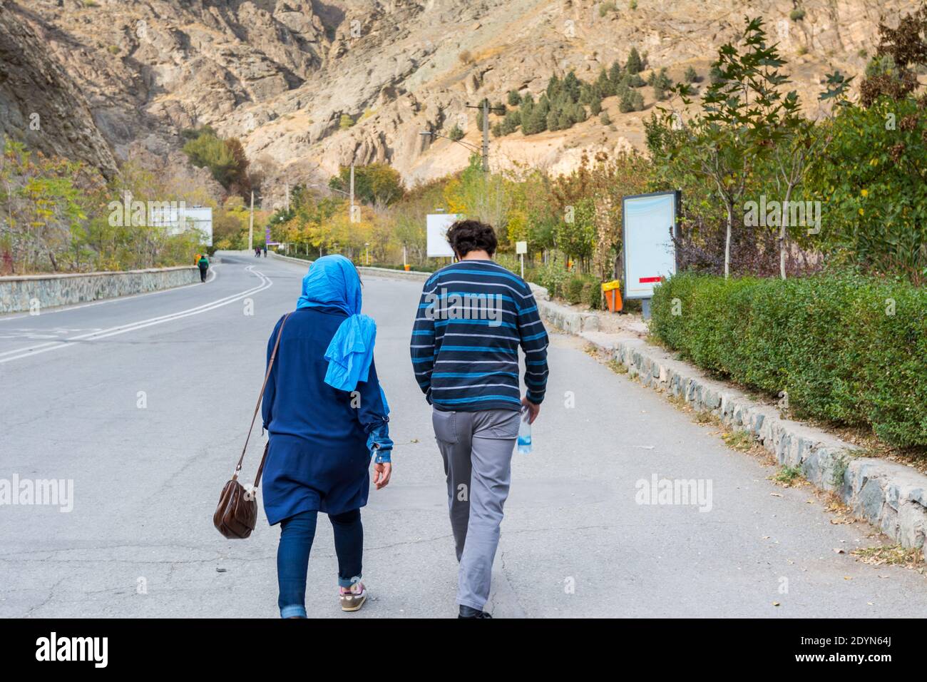 Iranian tourists walking at the the entrance to the Tochal complex in ...