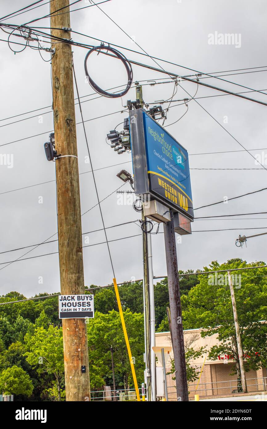Decatur, Ga / USA - 07 07 20: View of urban landscape with sign, power ...