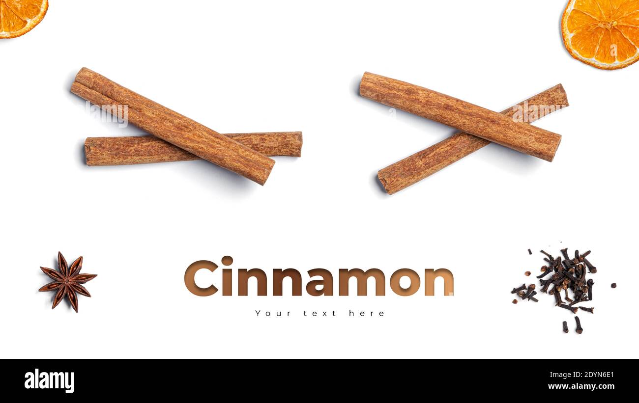 Cinnamon, dried oranges, star anise and cloves on a white background ...