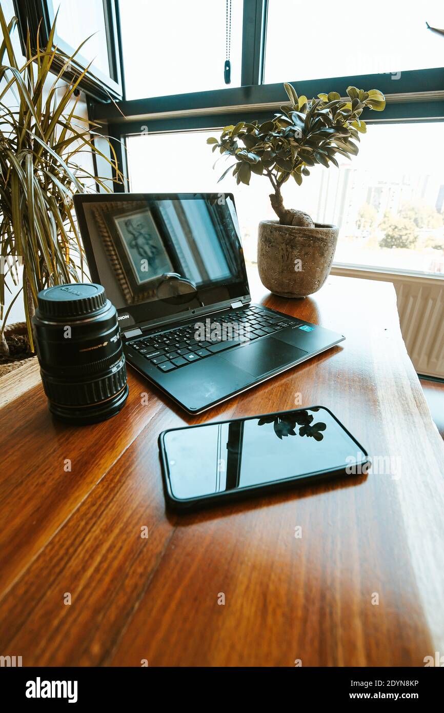 a bright window lite room shows a home office Stock Photo - Alamy