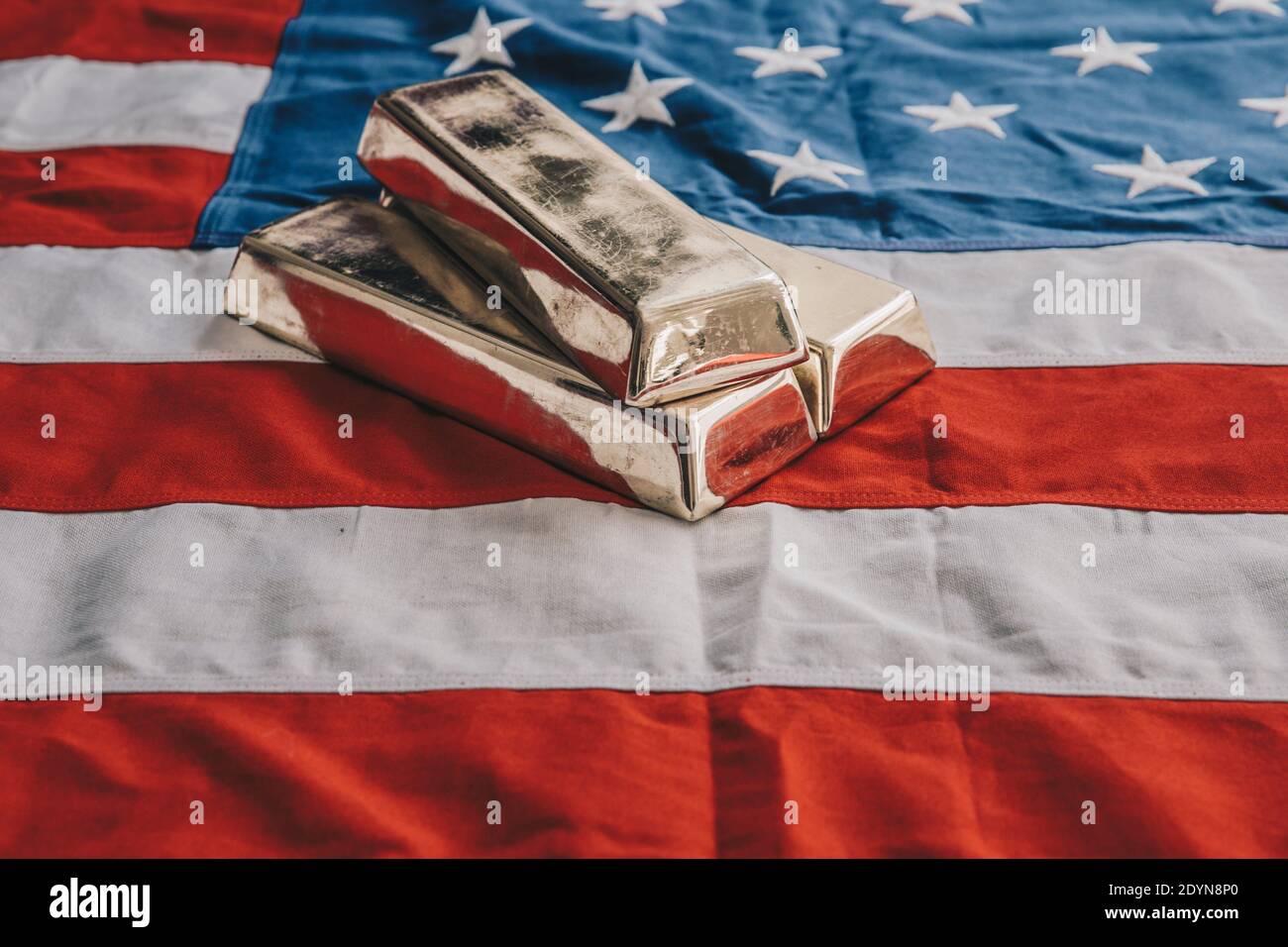 gold bars on an american flag Stock Photo - Alamy