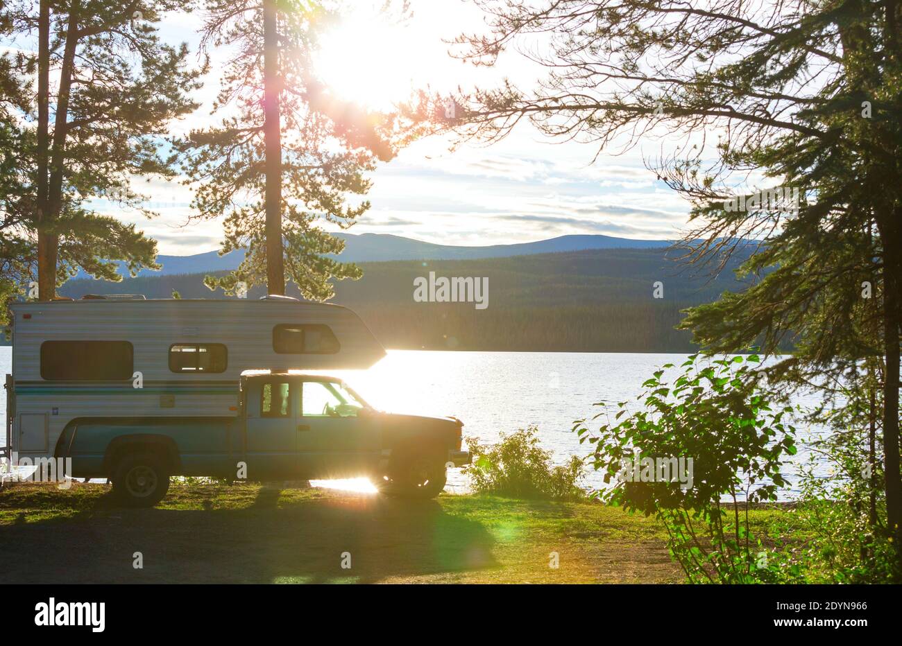 Camping car in recreation site at sunrise Stock Photo - Alamy