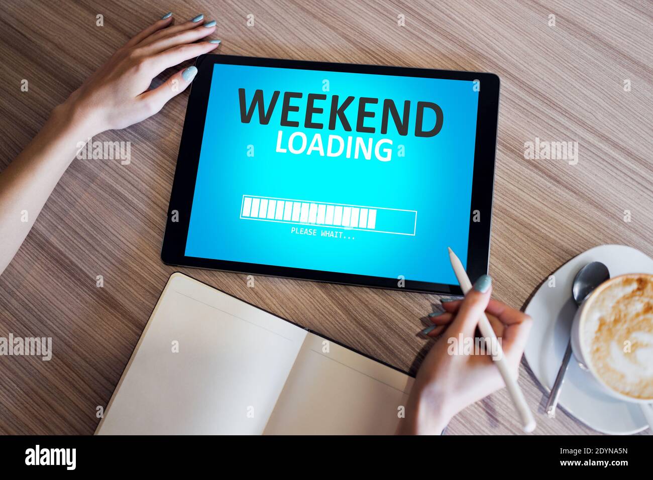 Weekend loading status bar message on device screen Stock Photo - Alamy