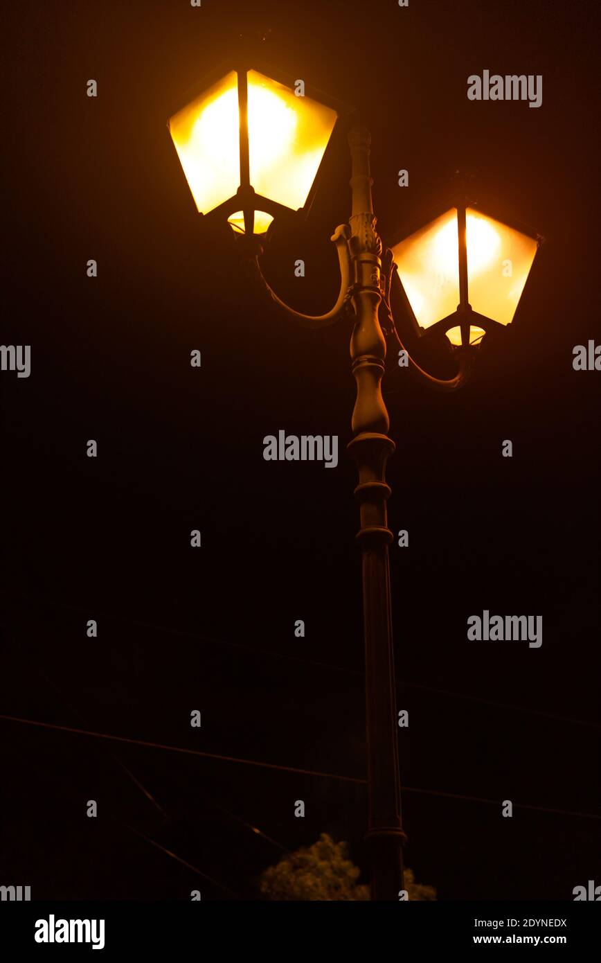 Close up of bright street lights on the city street at night Stock ...