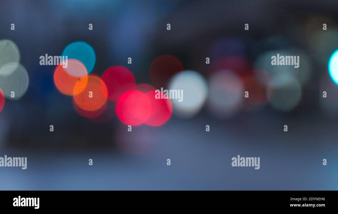 Colorful street lights with abstract background of blurred light spots ...