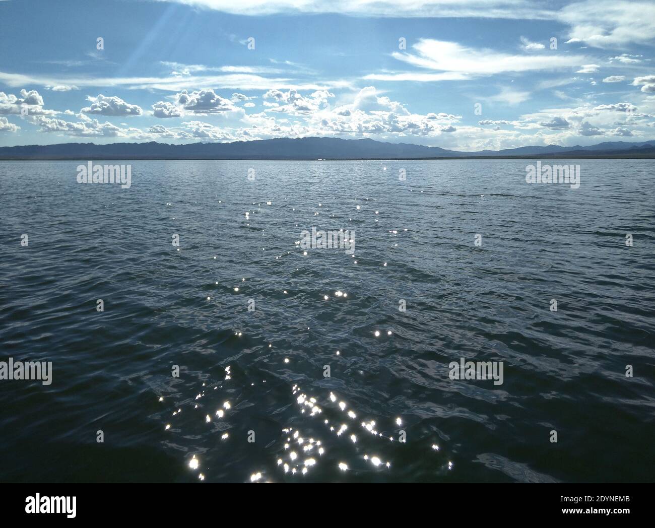 The sunlight shining on the lake; beautiful clouds and landscape Stock ...