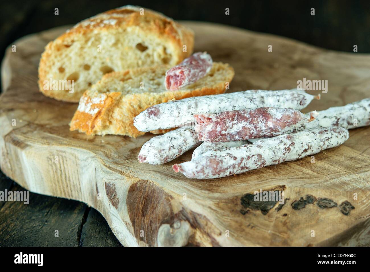 Little fingers of spanish sausage fuet and slices of white bread on the ...