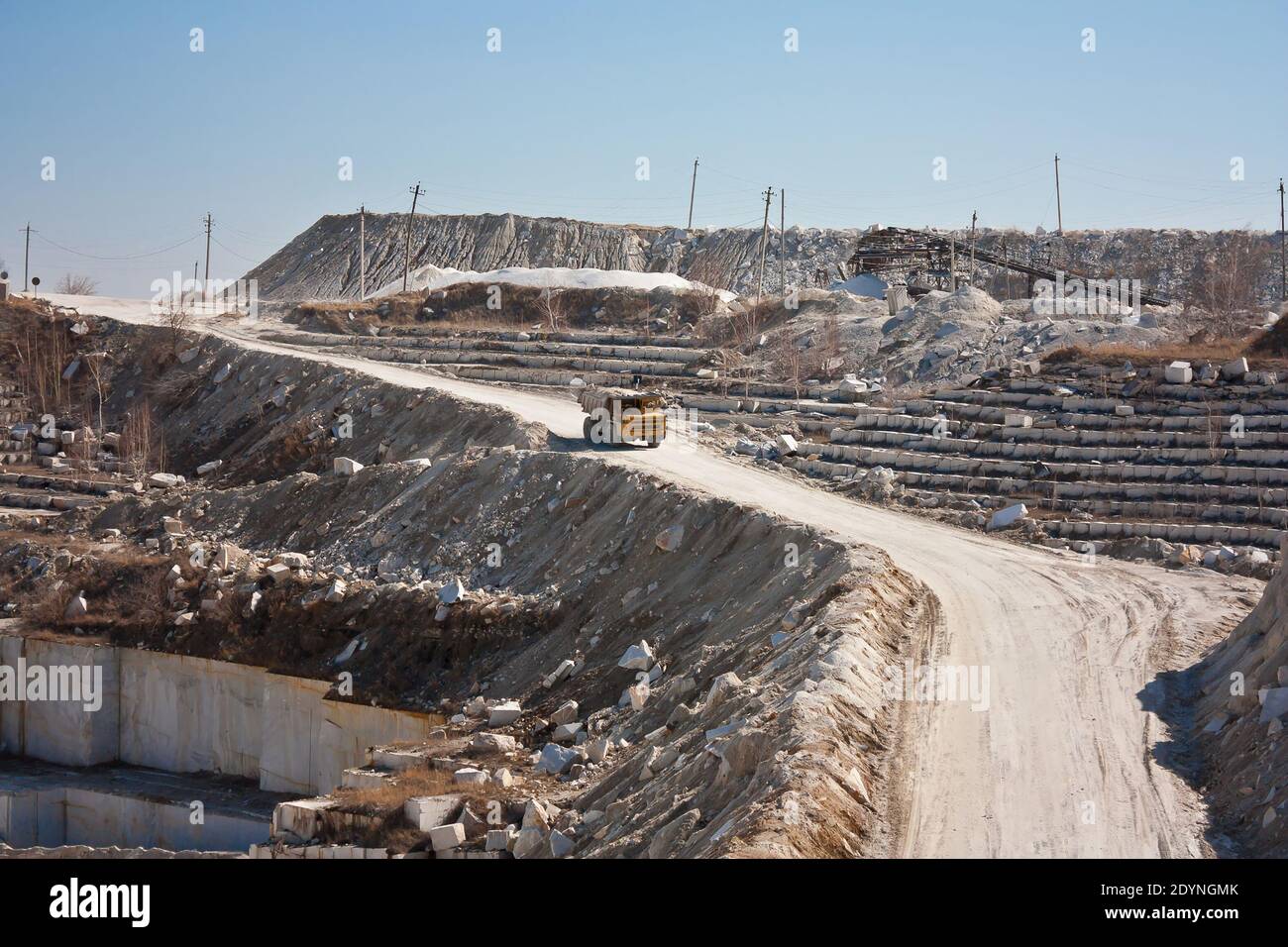 Marble quarry. A dumper rides in a career Stock Photo - Alamy