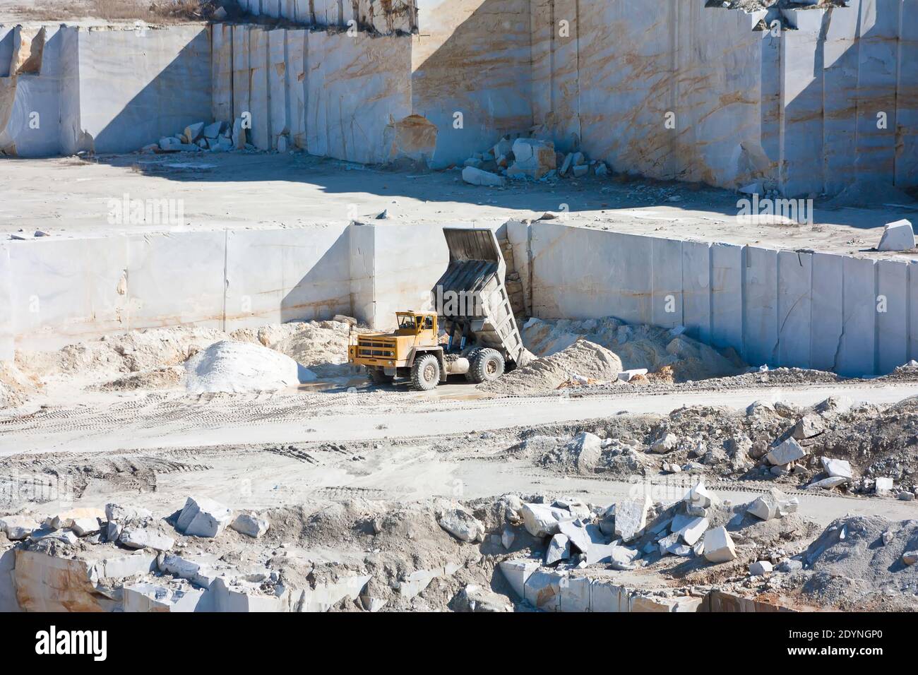 Open body mining dump truck in a marble quarry Stock Photo - Alamy
