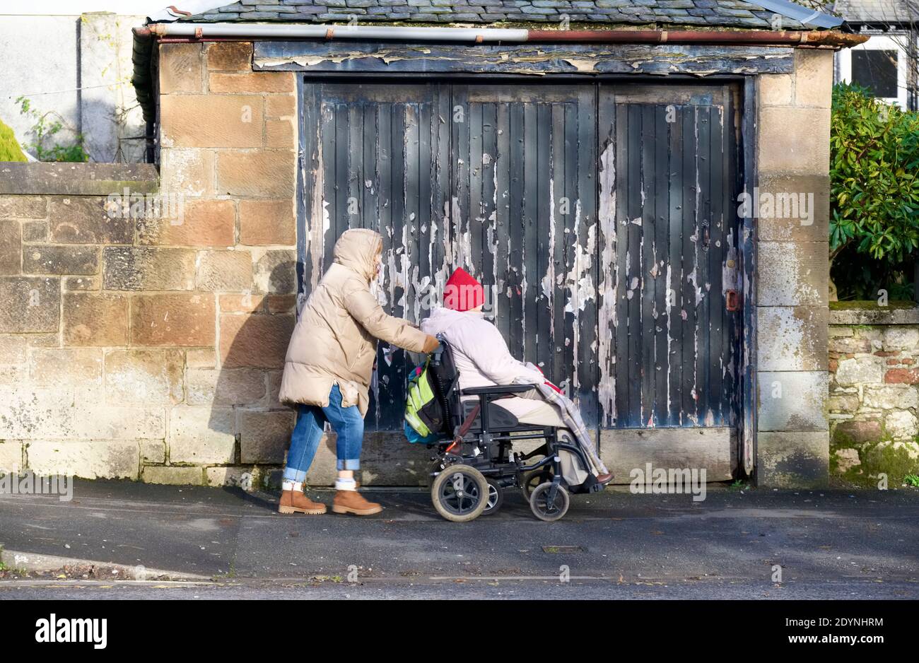Senior elderly vulnerable person in wheelchair for mobility Stock Photo ...