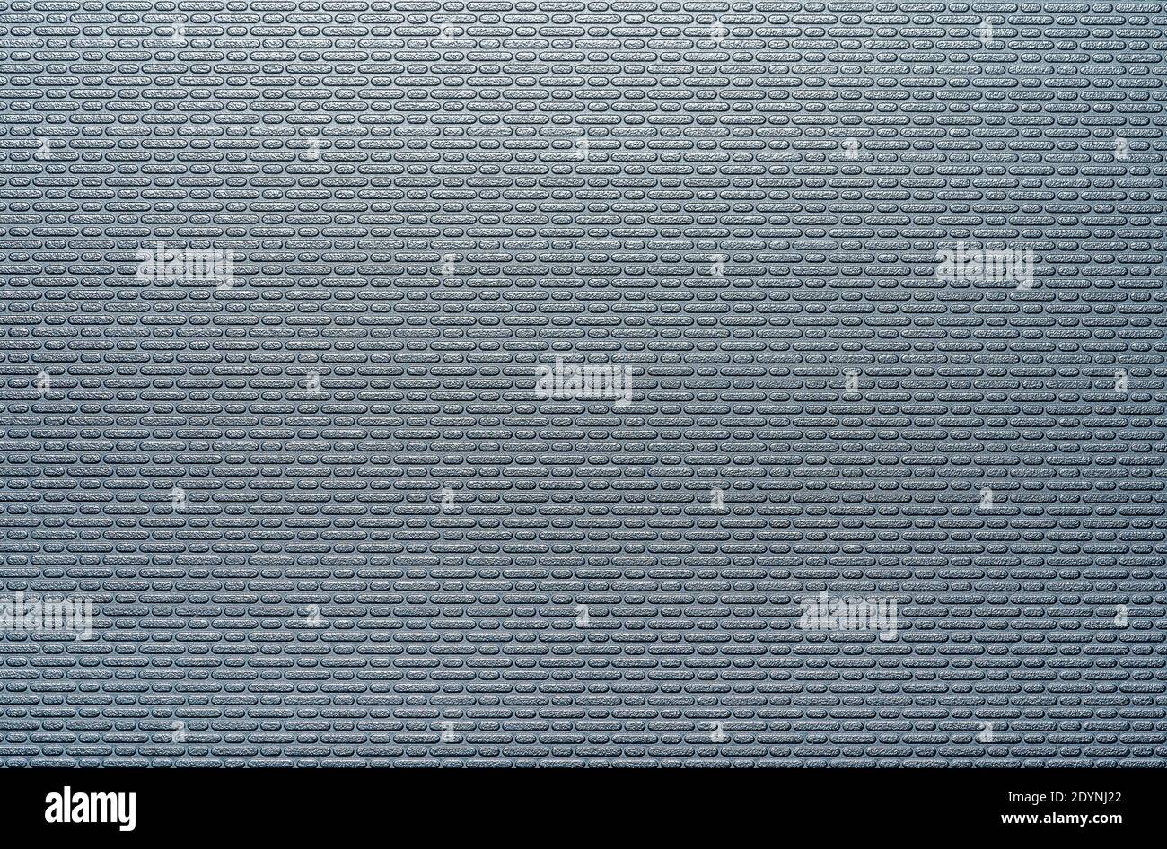 Macro texture on a black plastic toy Stock Photo - Alamy