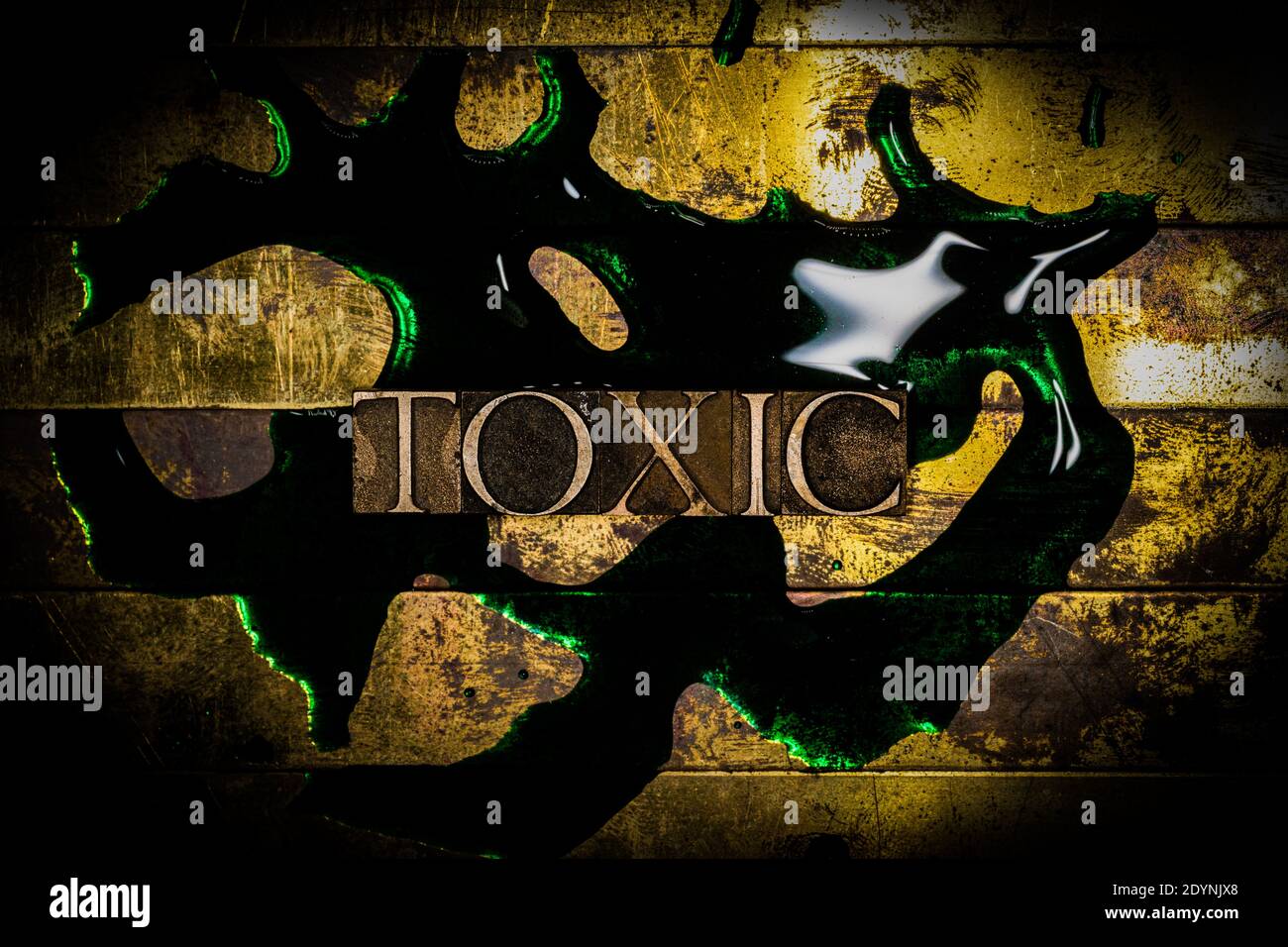 Toxic text message over green fluid on textured grunge copper and ...