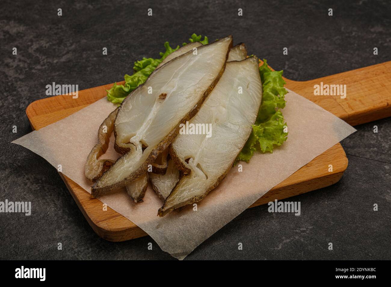 Delicous smoked halibut fish slices snack Stock Photo - Alamy