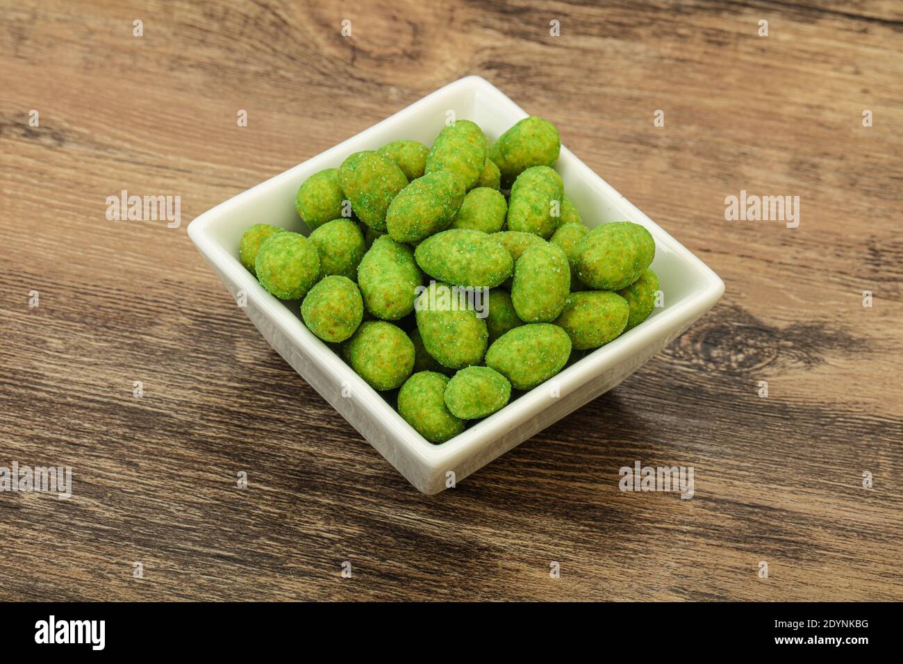Spicy wasabi peanuts snack in the bowl Stock Photo - Alamy
