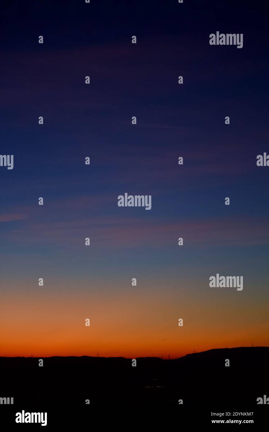 sun set over the hills Stock Photo - Alamy